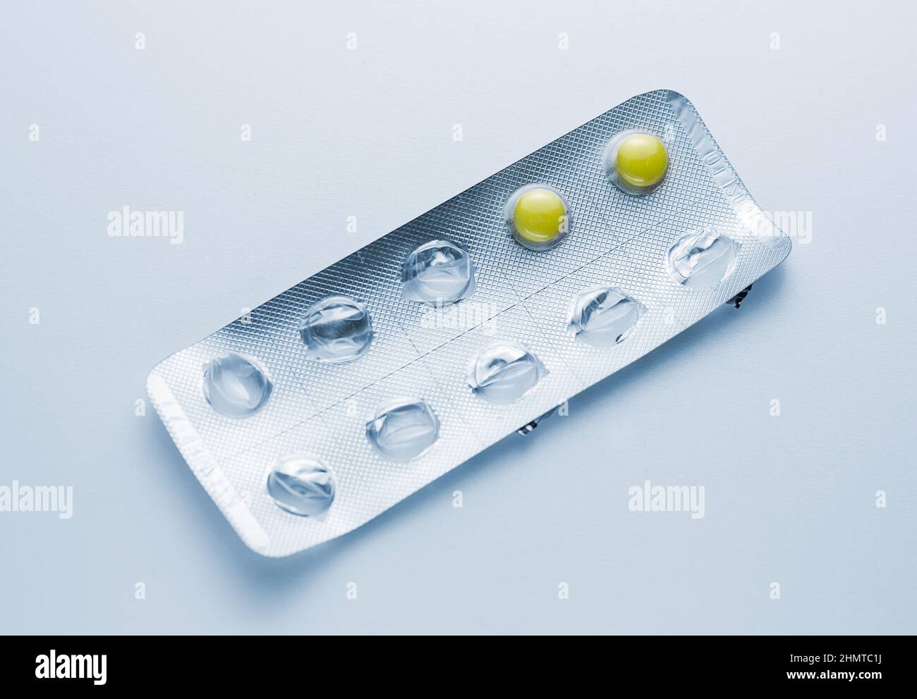Yellow Tablets pills flu in a Blister packaging doctor antibiotic ...