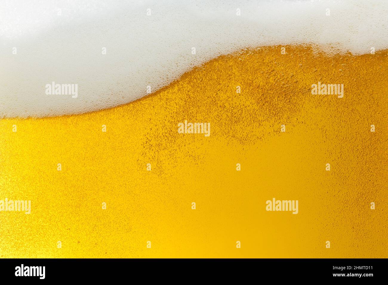 Beer wave with foam and bubbles on golden Yellow Background Stock Photo ...