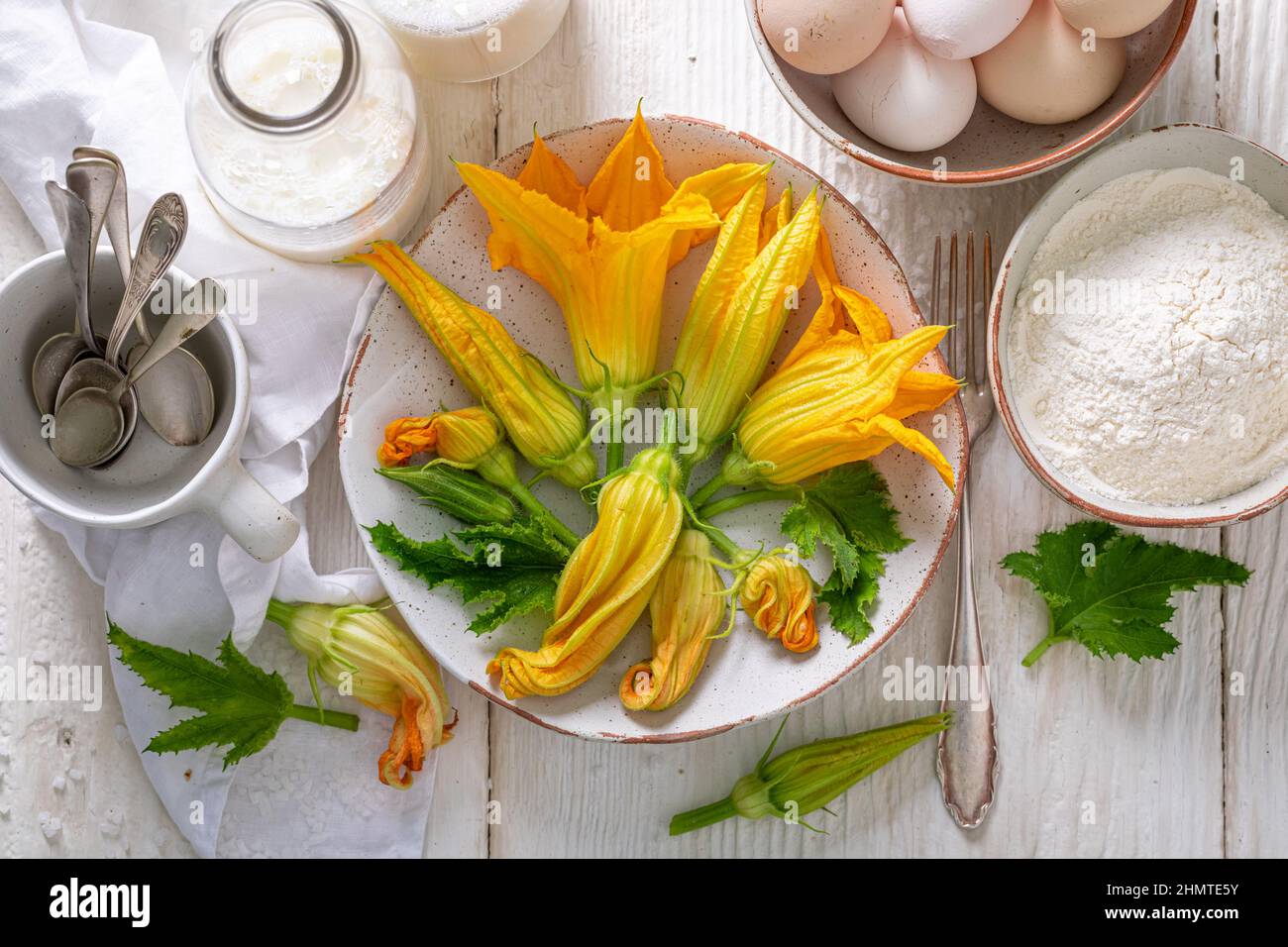 Preparation for roasted pumpkin flower made of pancake batter. Deep ...