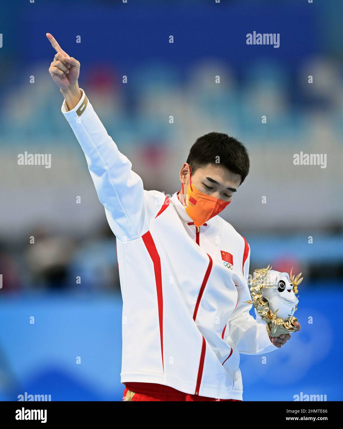 Beijing, China. 12th Feb, 2022. Gao Tingyu of China celebrates after ...