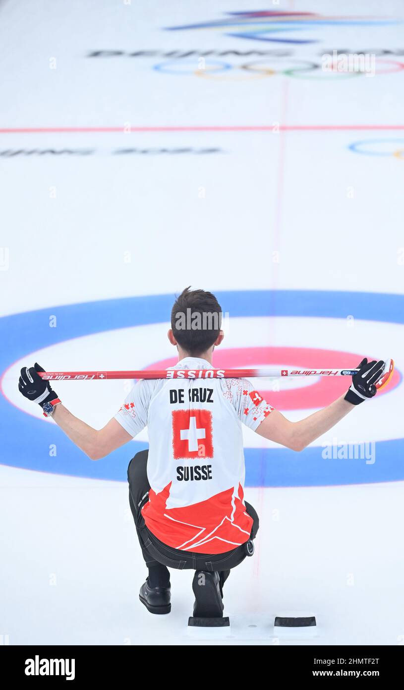 Beijing, China. 12th Feb, 2022. Peter de Cruz of Switzerland reacts ...