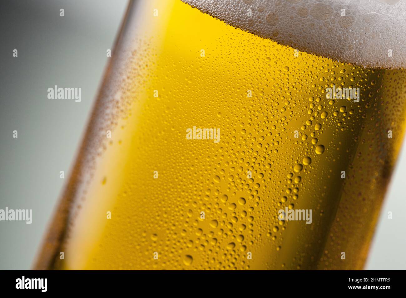 cold golden beer with condensation drops Stock Photo - Alamy