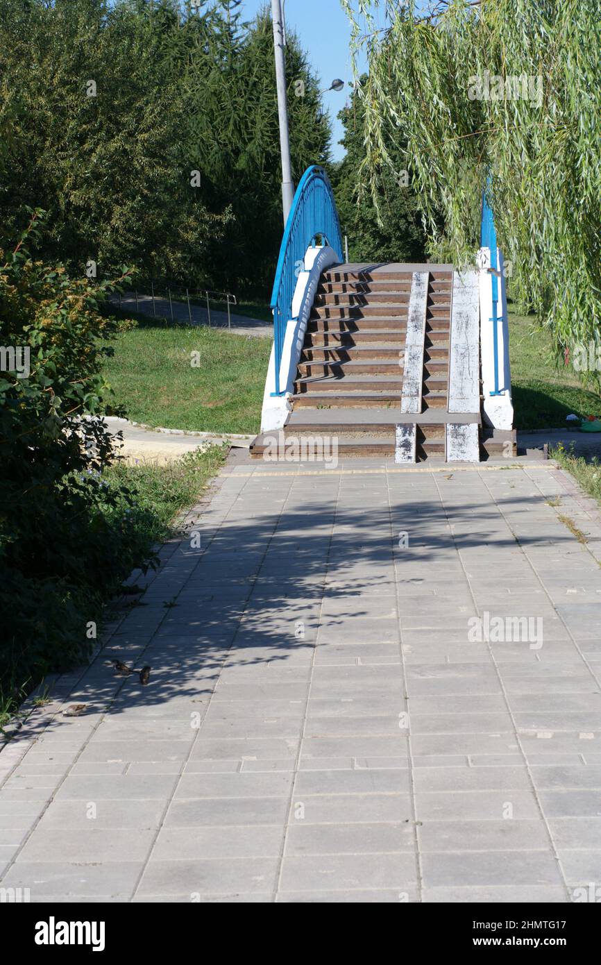 bridge over pond in park at dry sunny summer day Stock Photo - Alamy