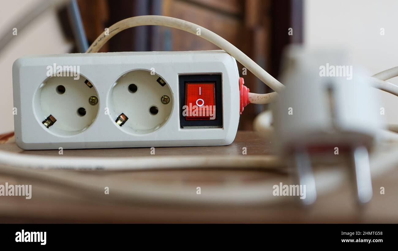 Power cord and USB on the table Stock Photo - Alamy