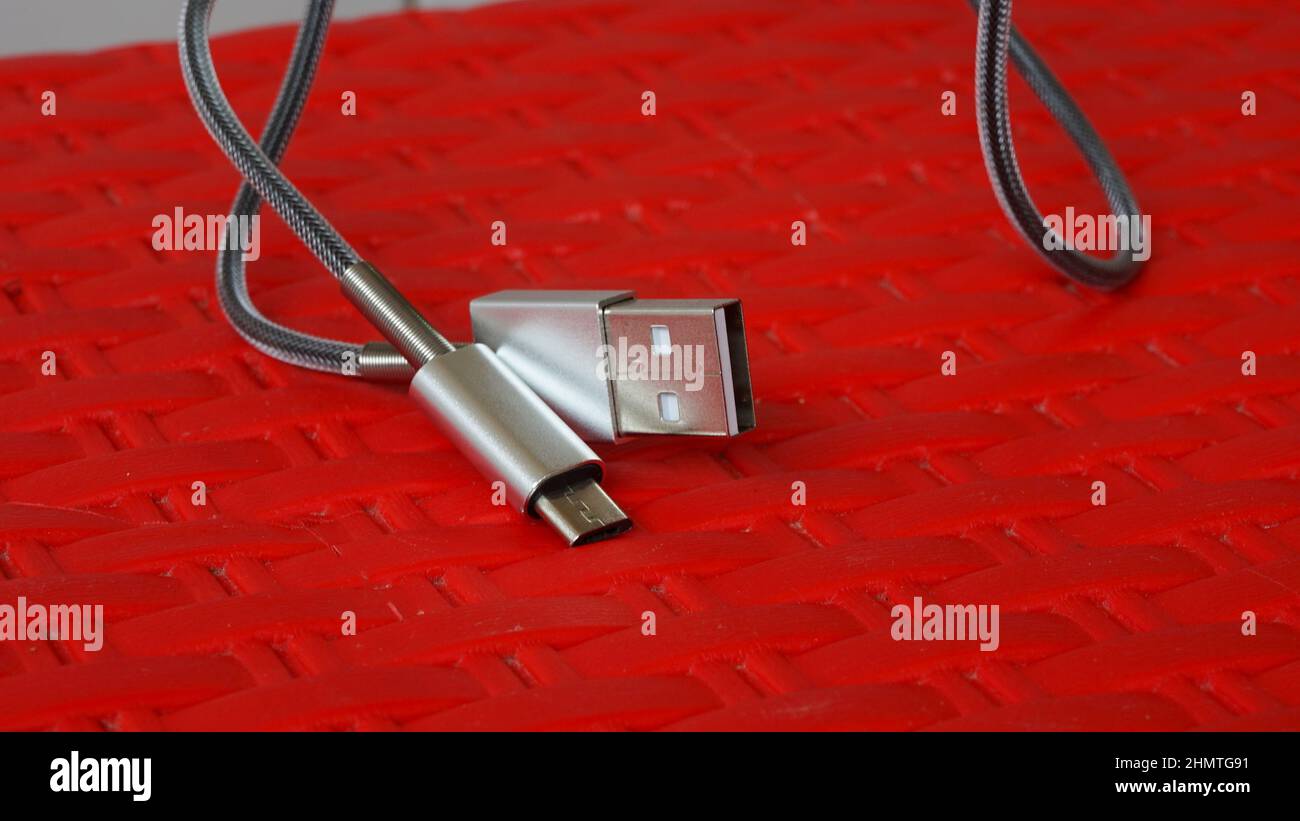 Power cord and USB on the table Stock Photo - Alamy
