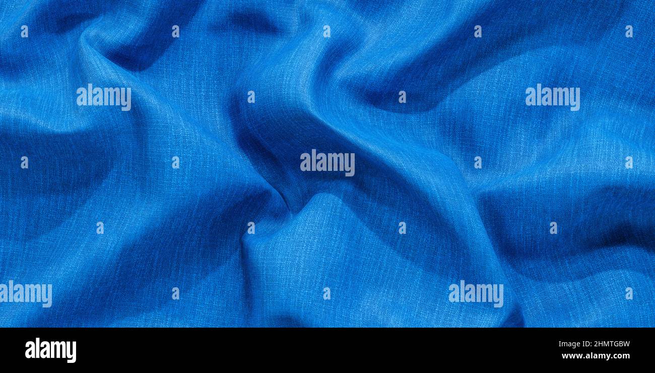 blue folded fabric surface with shadows and highlights 3d render ...