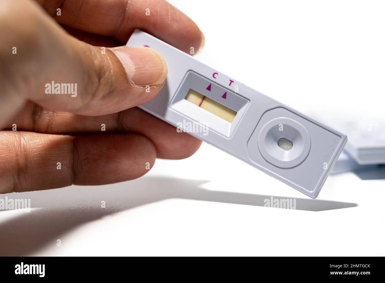hand holding a negative antigen test result Stock Photo - Alamy