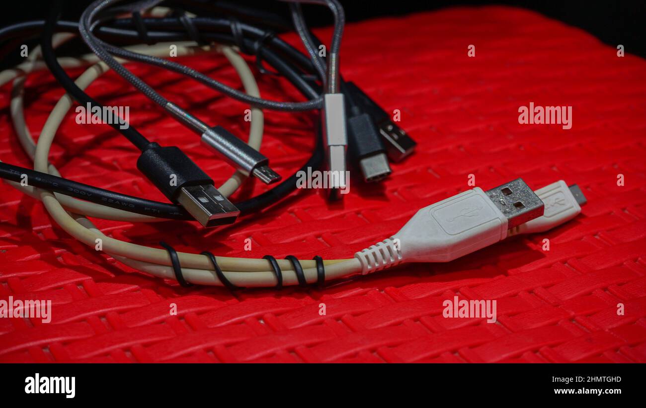 Power cord and USB on the table Stock Photo - Alamy