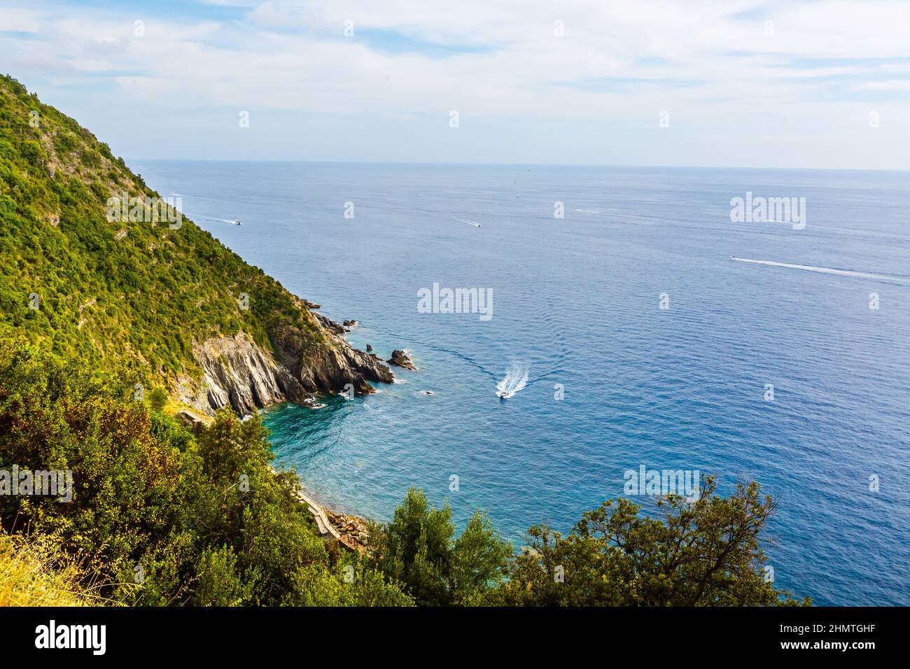 Fishing boats moored on water in harbor of Ligurian and Mediterranean ...