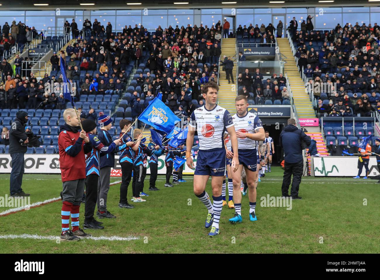 Stefan Ratchford #1 of Warrington Wolves and team captain walks ...