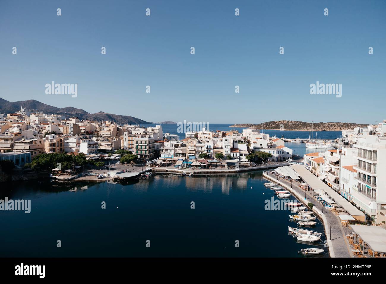 Beautiful view of small town Agios Nikolaos and Voulismeni lake in ...