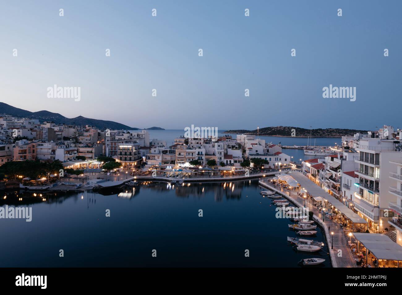 Beautiful view of small town Agios Nikolaos and Voulismeni lake in ...