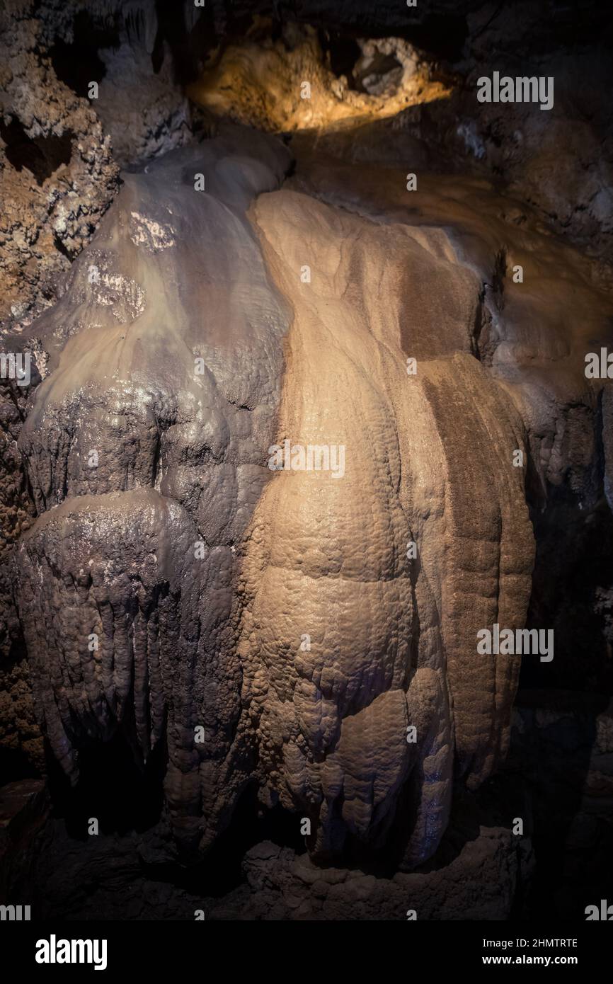 Image of a giant stalagmite in a an underground cave Stock Photo - Alamy