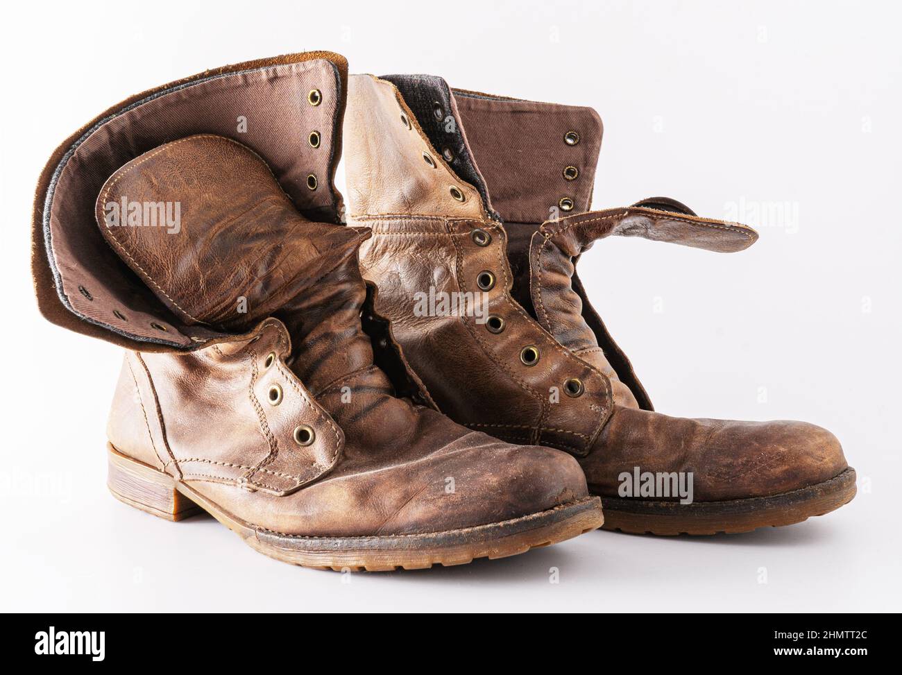 Worn out brown leather boots hi-res stock photography and images - Alamy