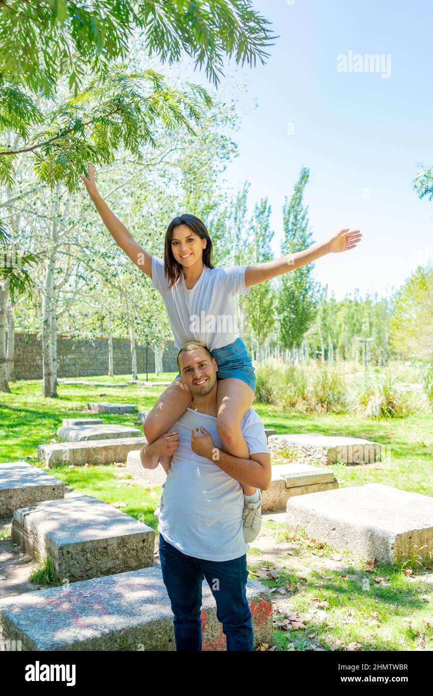 Man carrying girl on shoulders hi-res stock photography and images - Alamy