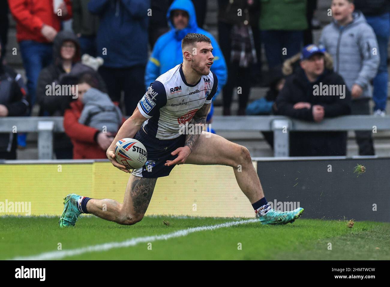 Connor Wrench #23 of Warrington Wolves celebrates his try Stock Photo ...