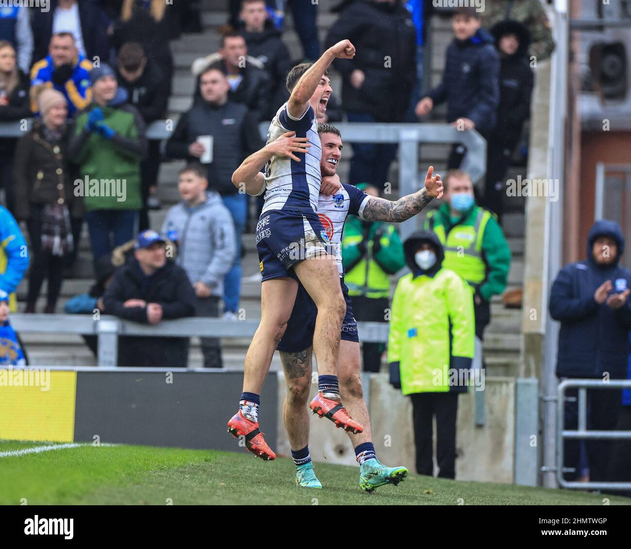 Connor Wrench #23 of Warrington Wolves celebrates his try Stock Photo ...