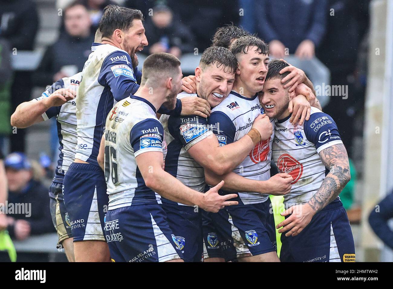 Connor Wrench #23 of Warrington Wolves celebrates his try Stock Photo ...