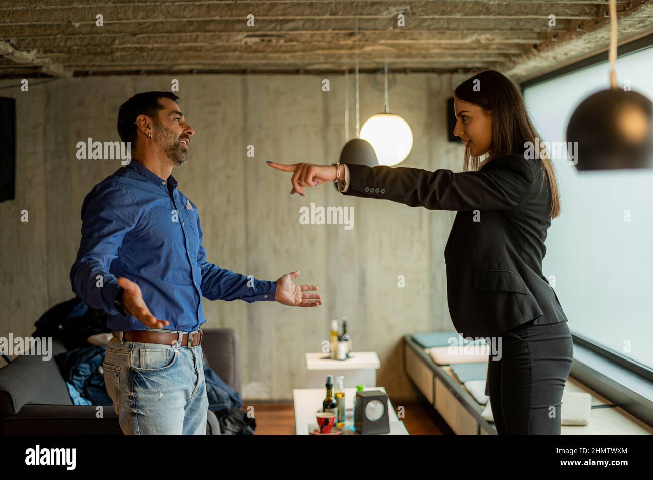 Attractive female boss is firing her employee for being late Stock ...