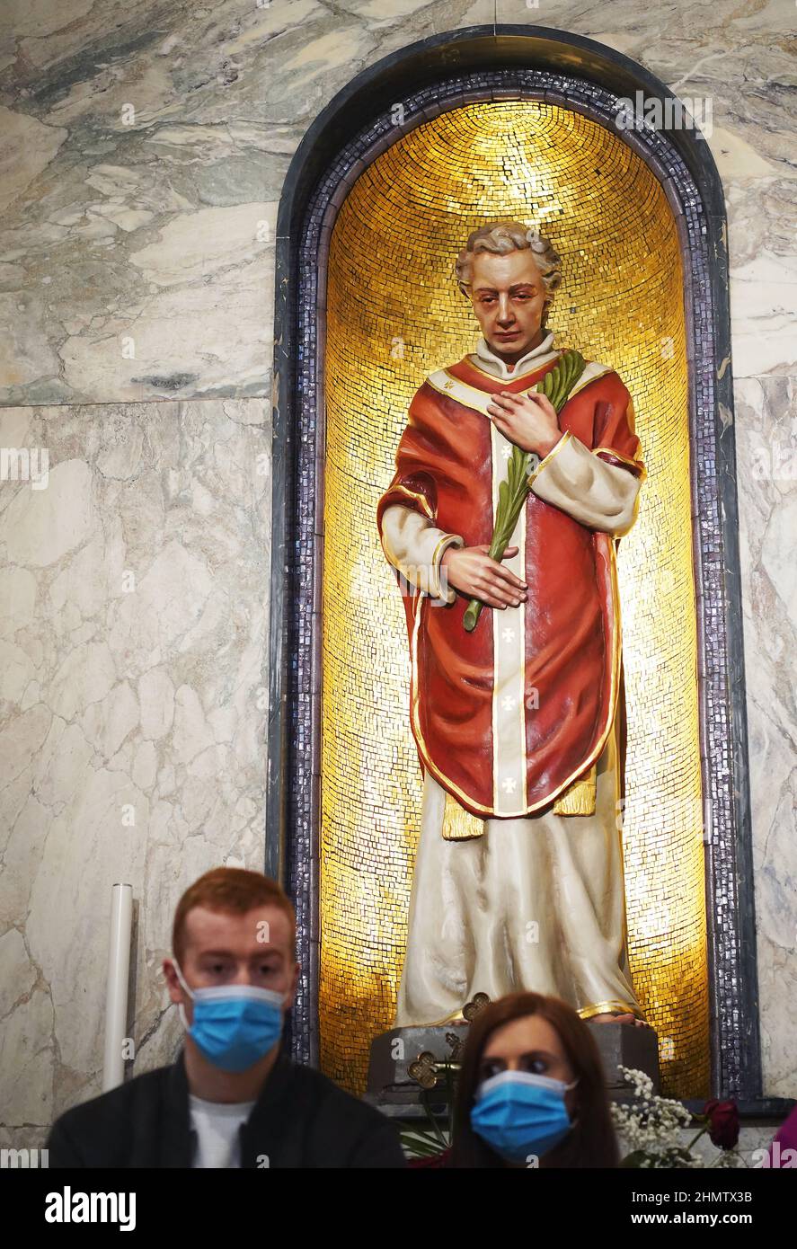 Engaged couples take part in a blessing at the Shrine of the Saint ...