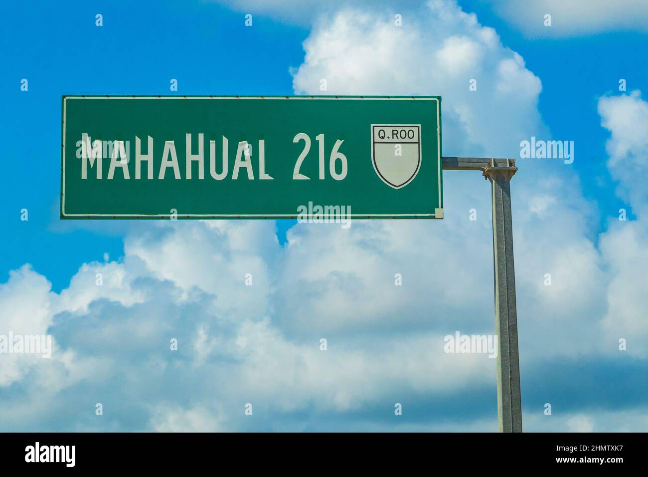 Tulum Mexico 02. February 2022 Green turquoise road sign on the road ...