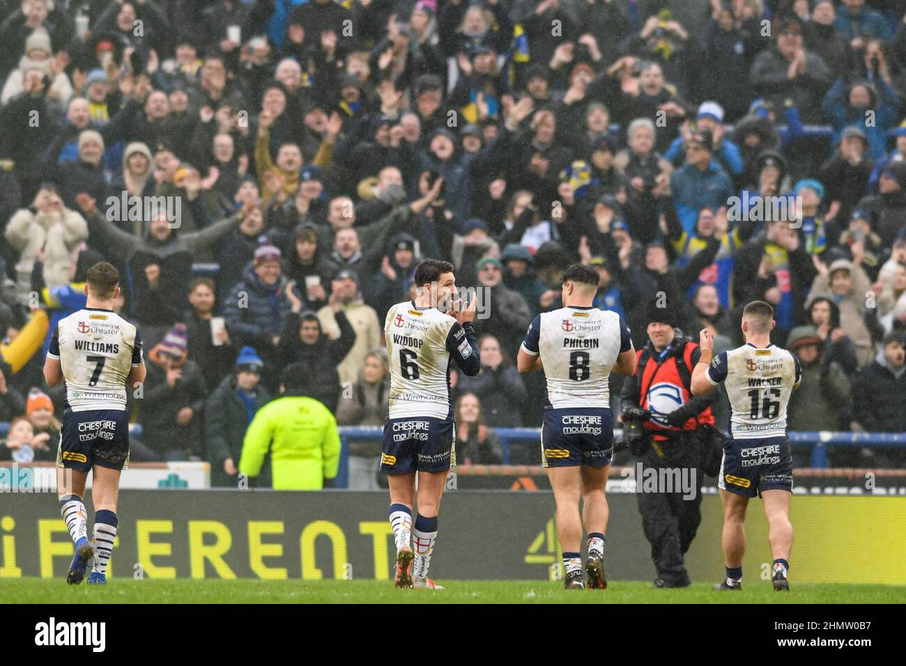 Gareth Widdop #6 of Warrington Wolves leads the celebrations in front ...