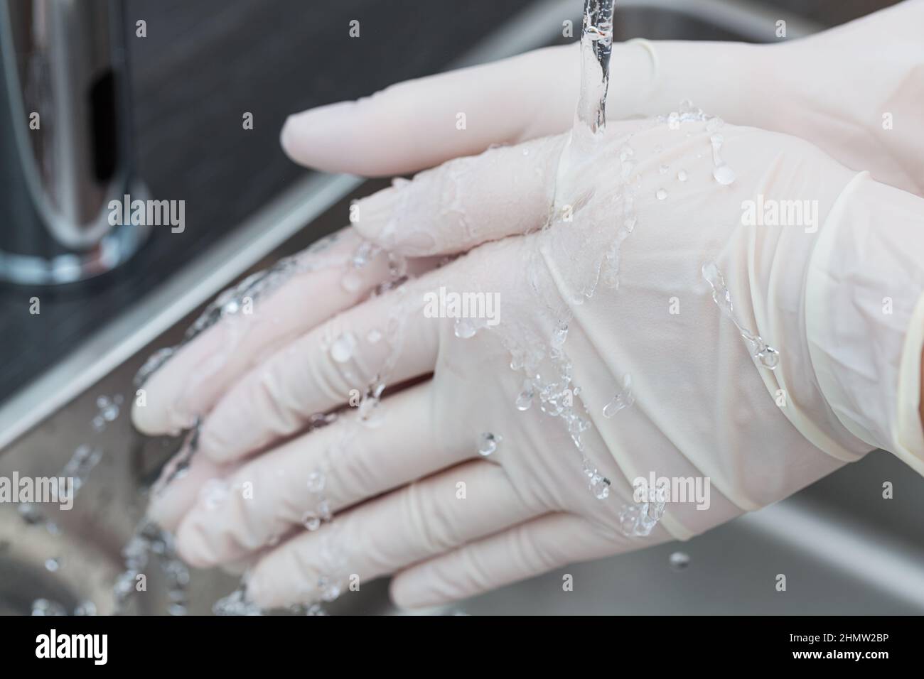 Personal hygiene washing hands gloves hi-res stock photography and ...