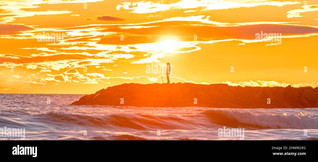 Panorama of a sunset on a dike with a view of the sea in La Grande ...