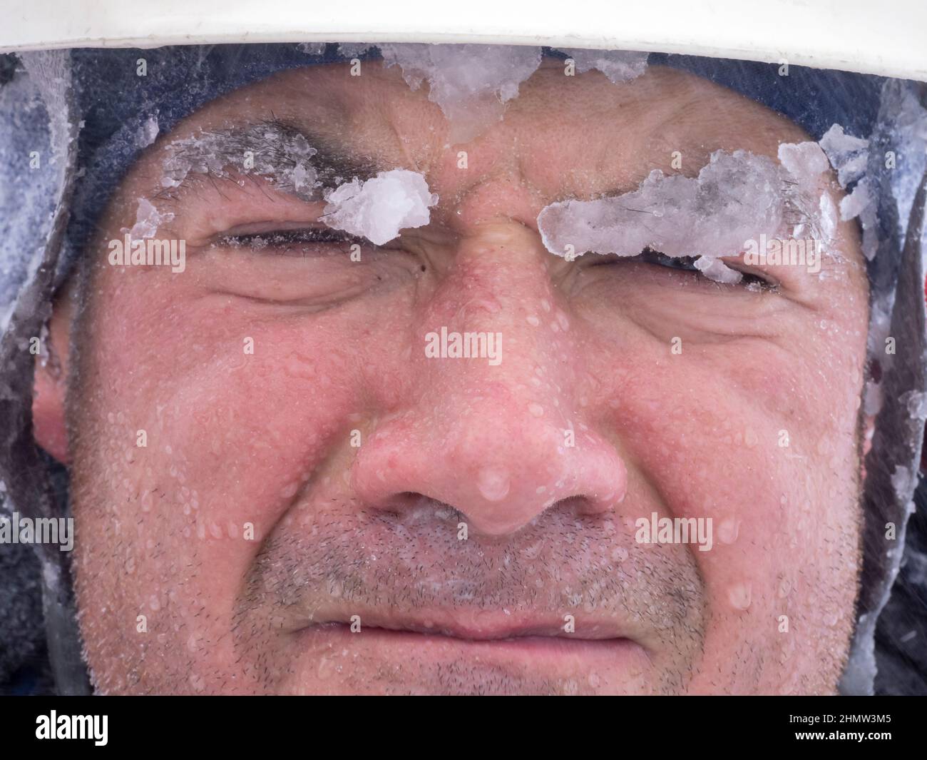 A Mountaineer on the Cairngorm Plateau, Scotland, UK with frozen ...