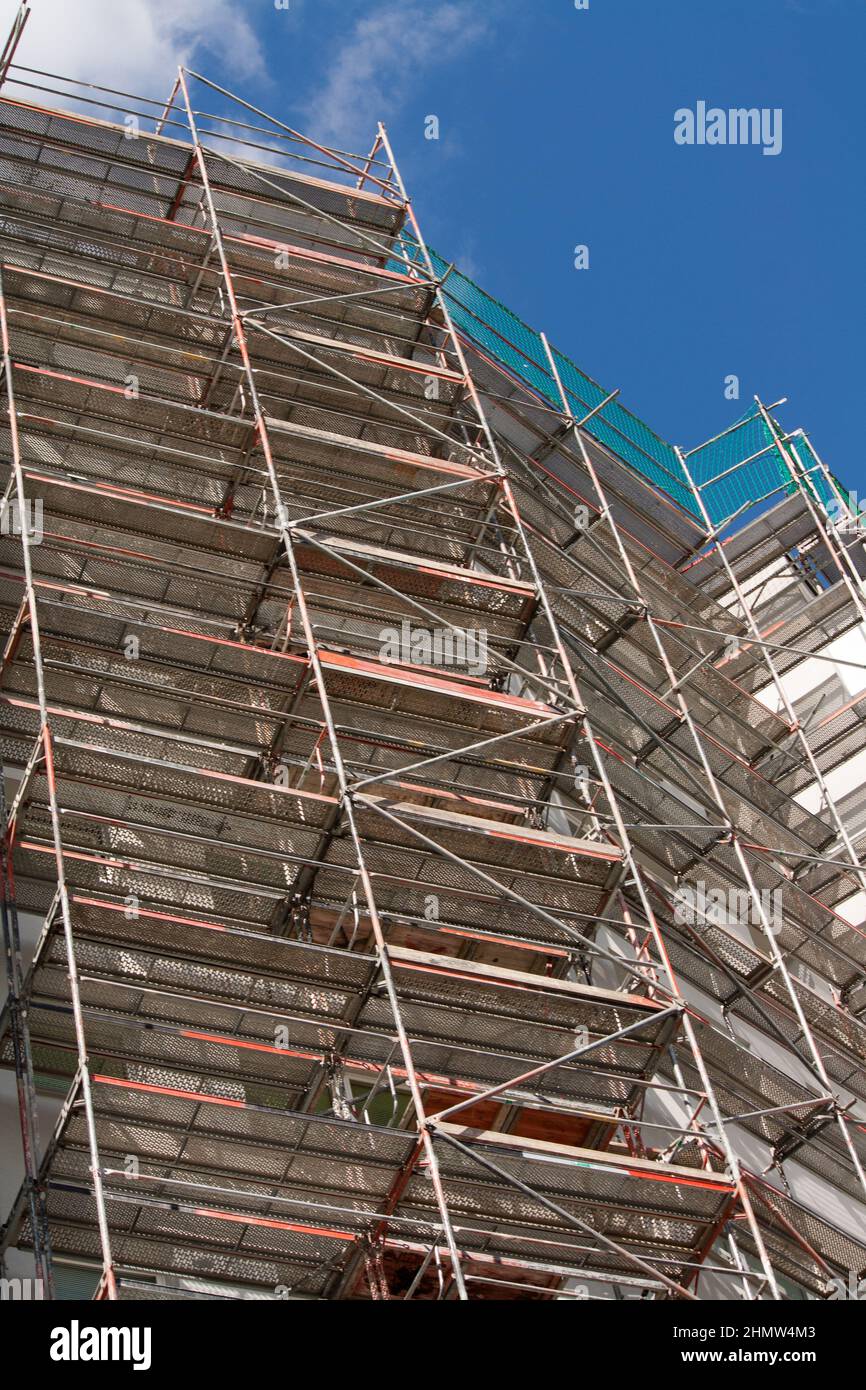 construction scaffolding standing on the side of a building Stock Photo ...