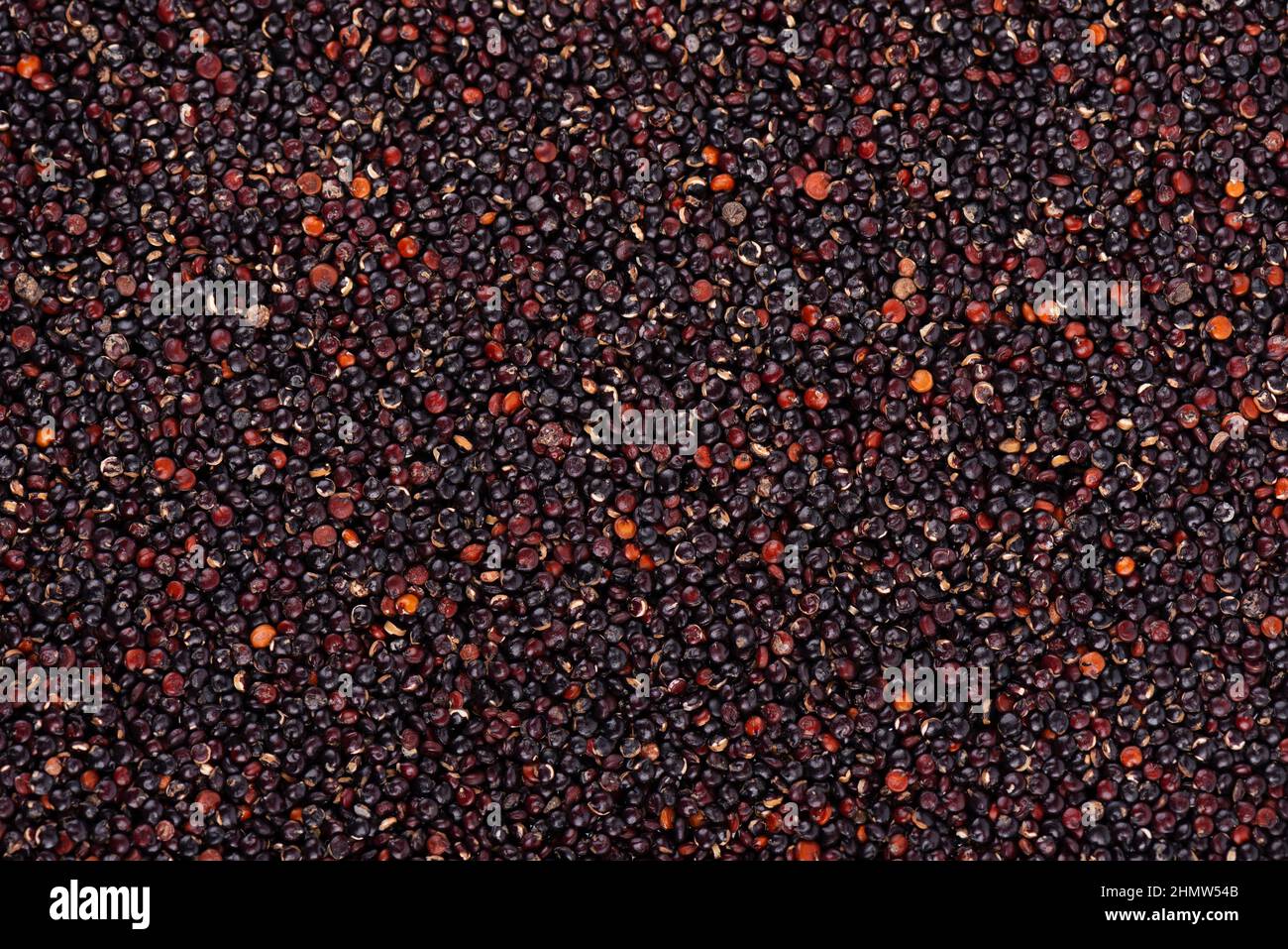 Black quinoa seeds background. Pile of raw kinwa. Top view Stock Photo ...