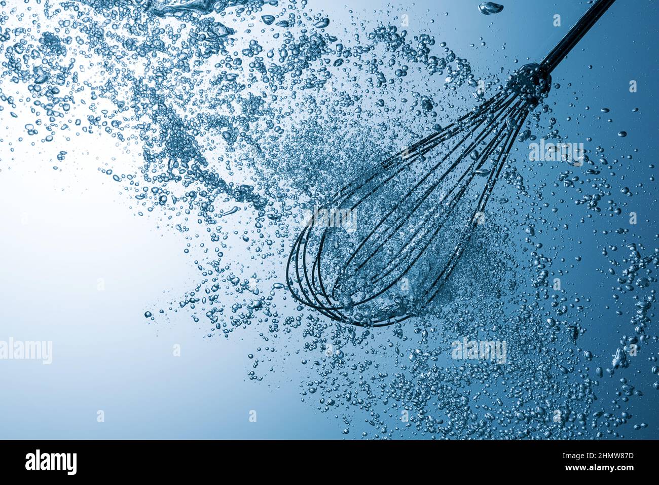 stirring Whisk in water Stock Photo - Alamy