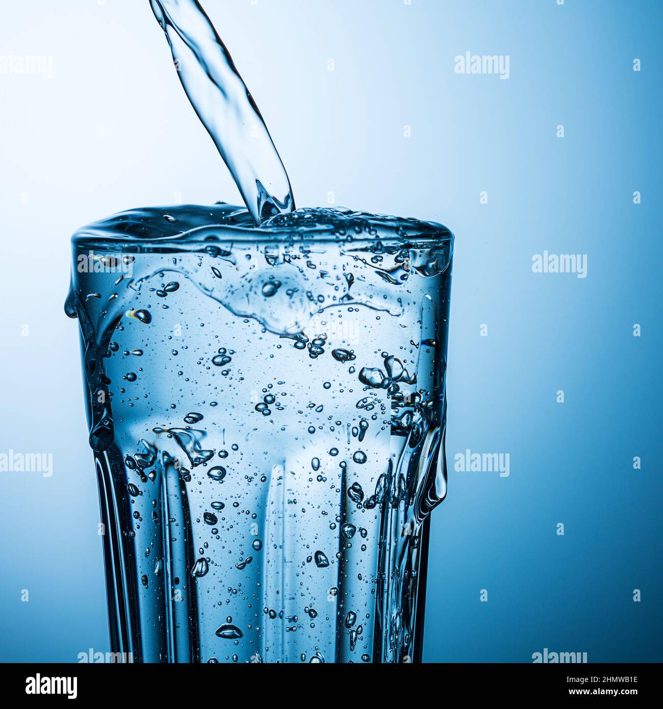 Pouring water glass overflowing hi-res stock photography and images - Alamy