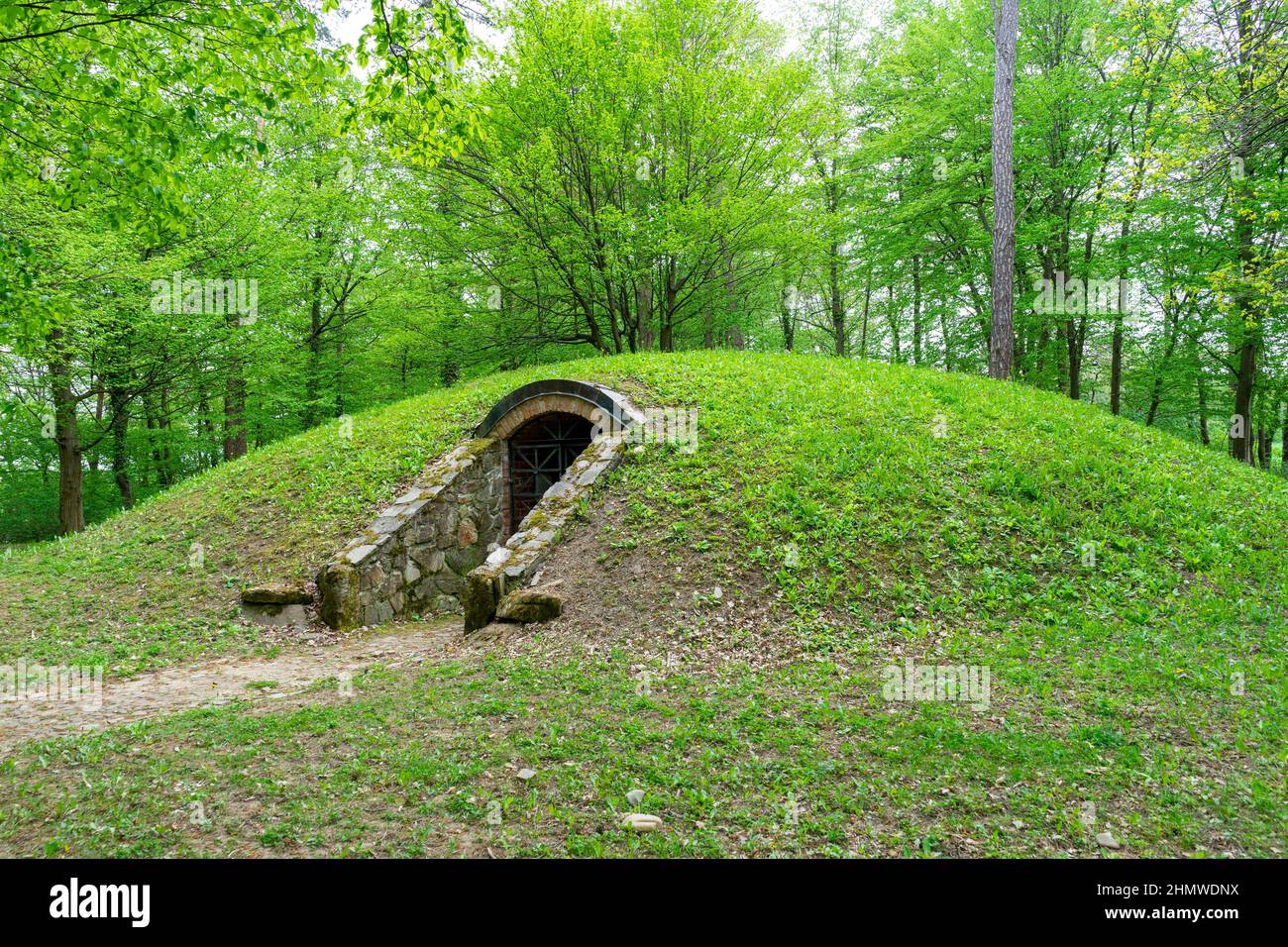 Ancient tumulus on a display for visitors Stock Photo - Alamy