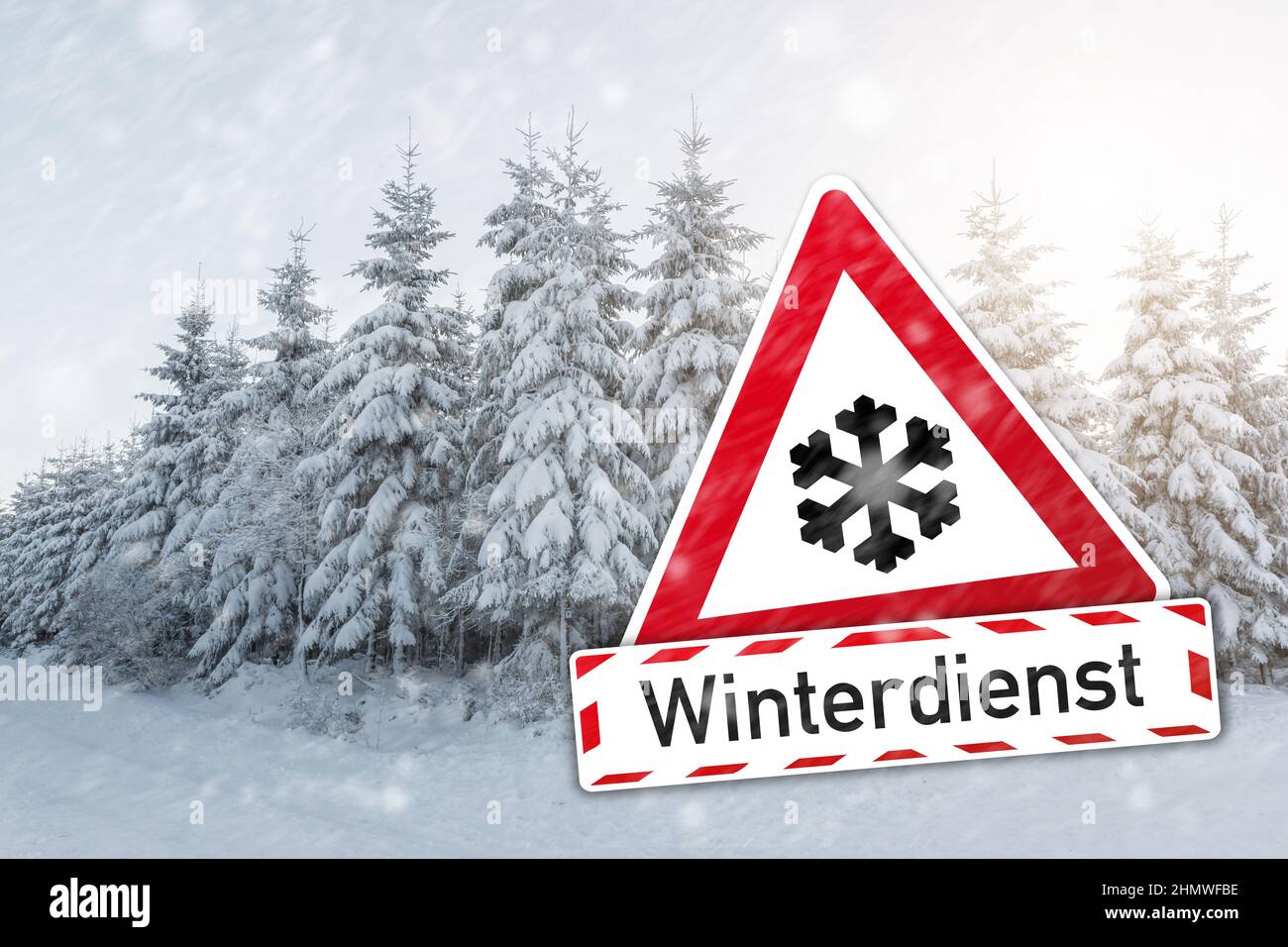 warning sign with German word Winterdienst (winter services) with snow ...
