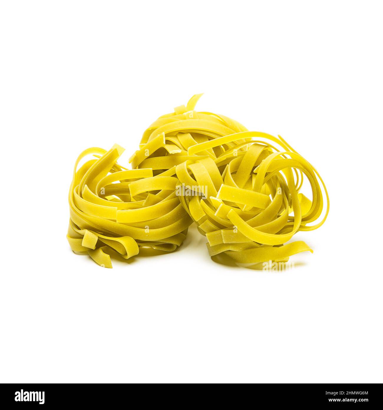 Fettuccine nests pasta Cut Out Stock Images & Pictures - Alamy