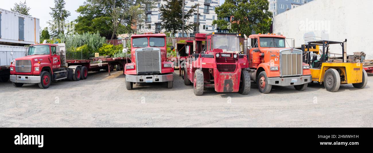 panorama wide angled view of a line of heavy trucks in Seattle ...