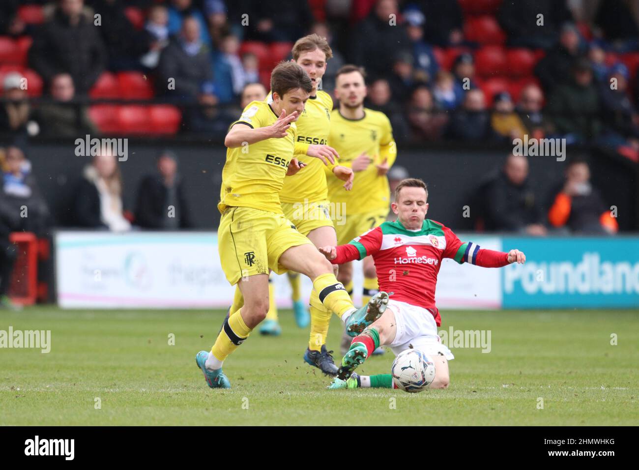 Walsall, UK. 12th Feb, 2022. Charlie Jolley of Tranmere Rovers and Liam ...