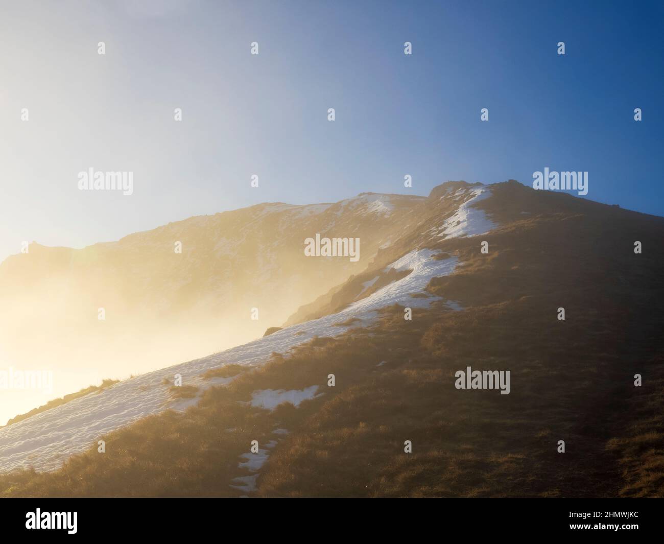 Red Screes above valley mist from a temperature inversion in the Lake ...