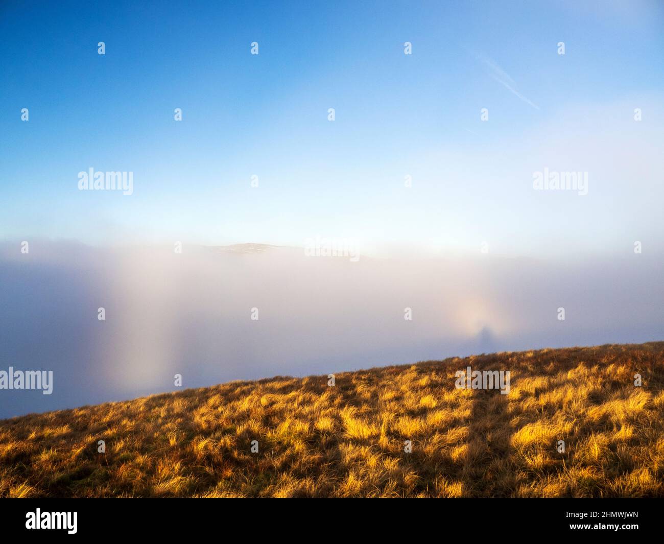 The Helvellyn mountain range with Striding Edge, poking out of the ...