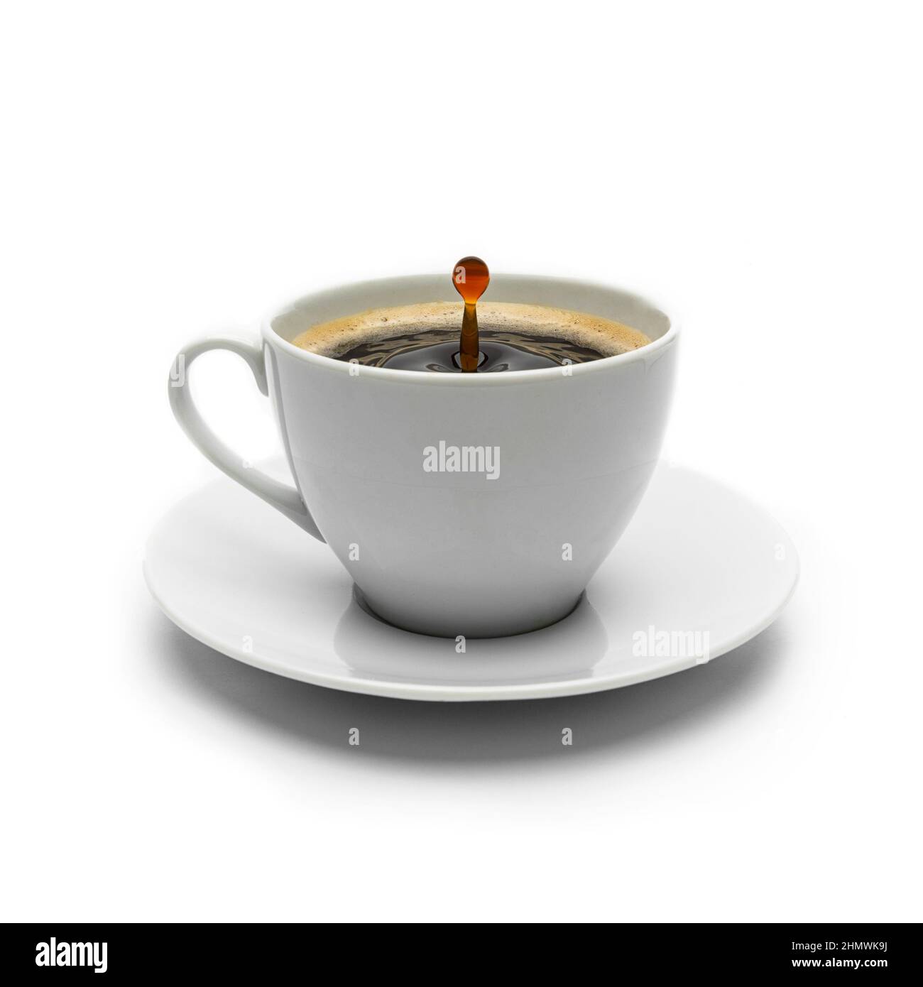 cup of coffee with drop impact Stock Photo - Alamy