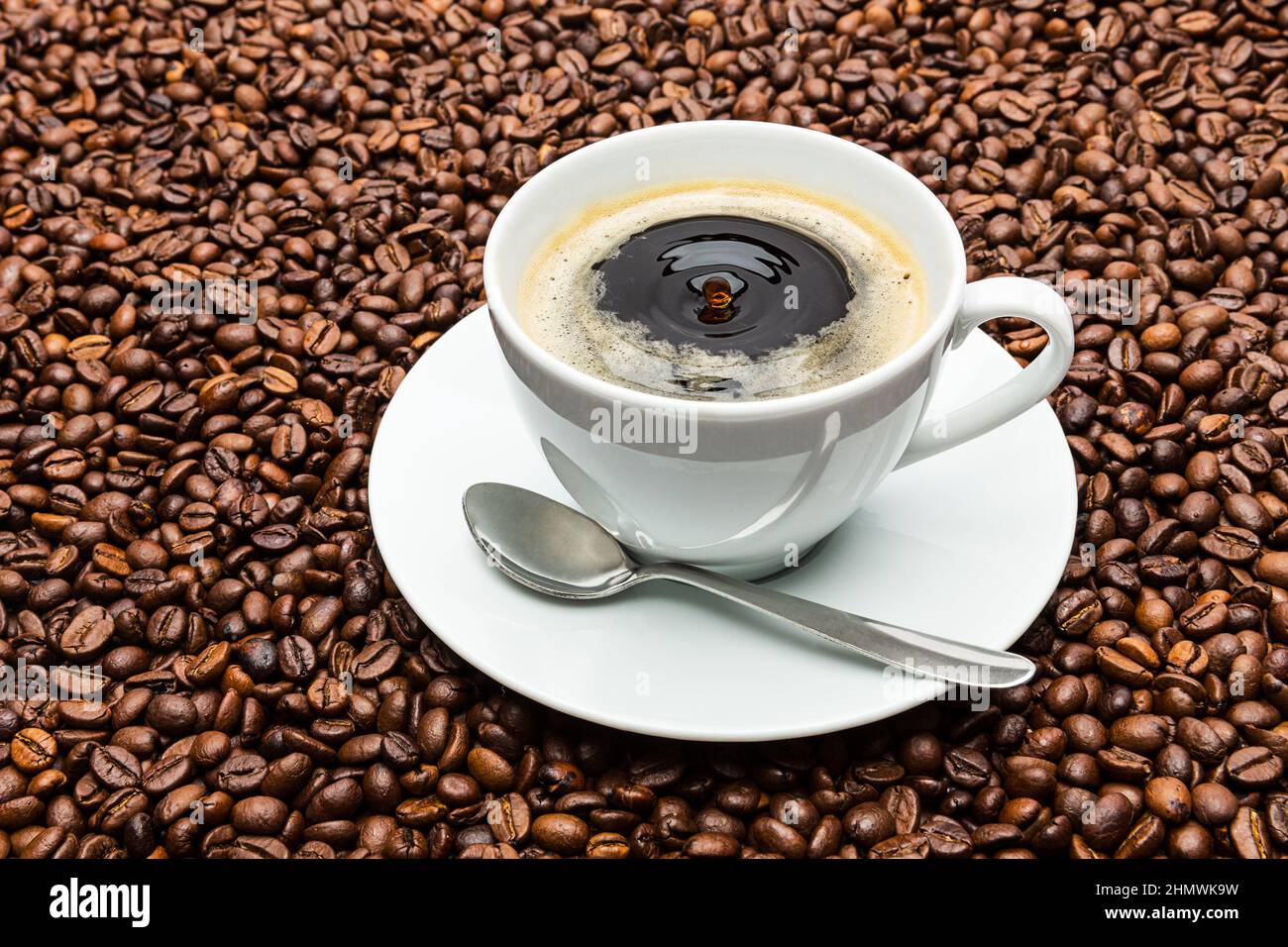 cup of coffee with floating drop Stock Photo - Alamy