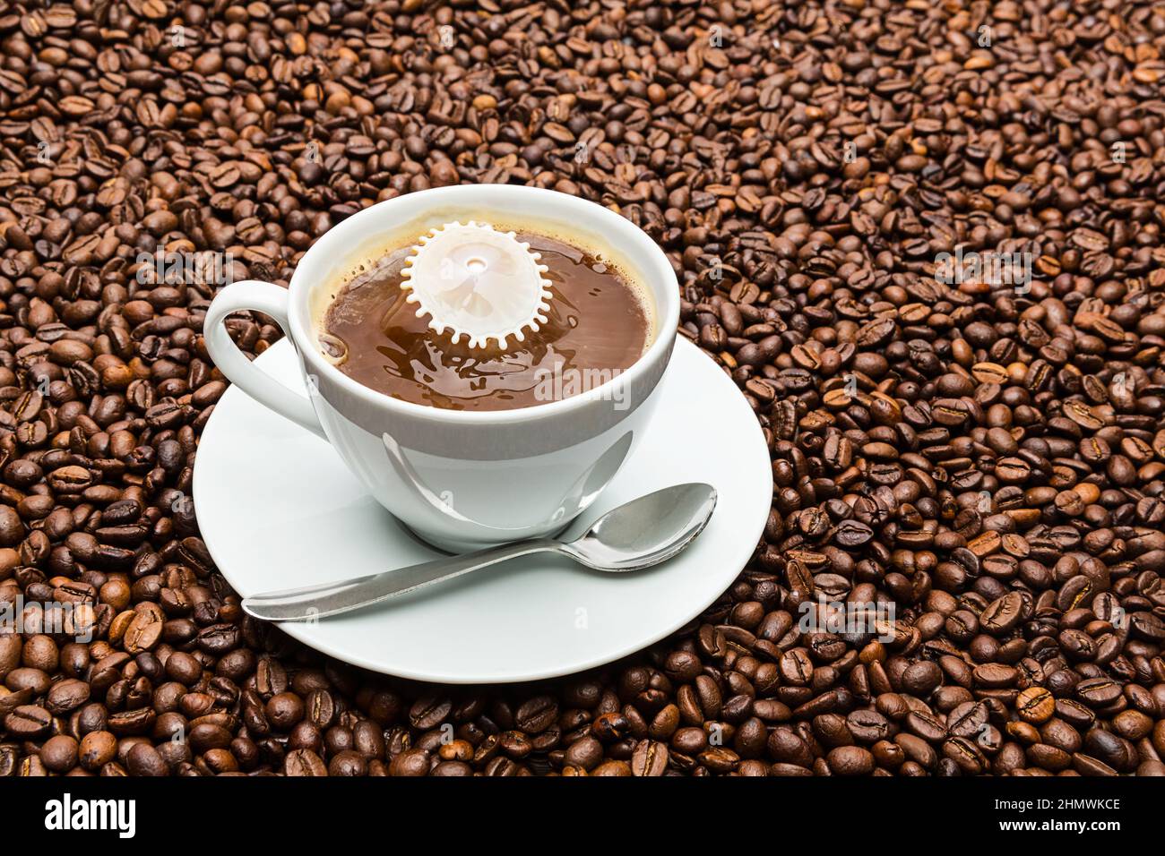 Latte with drop impact Liquid Art Stock Photo - Alamy