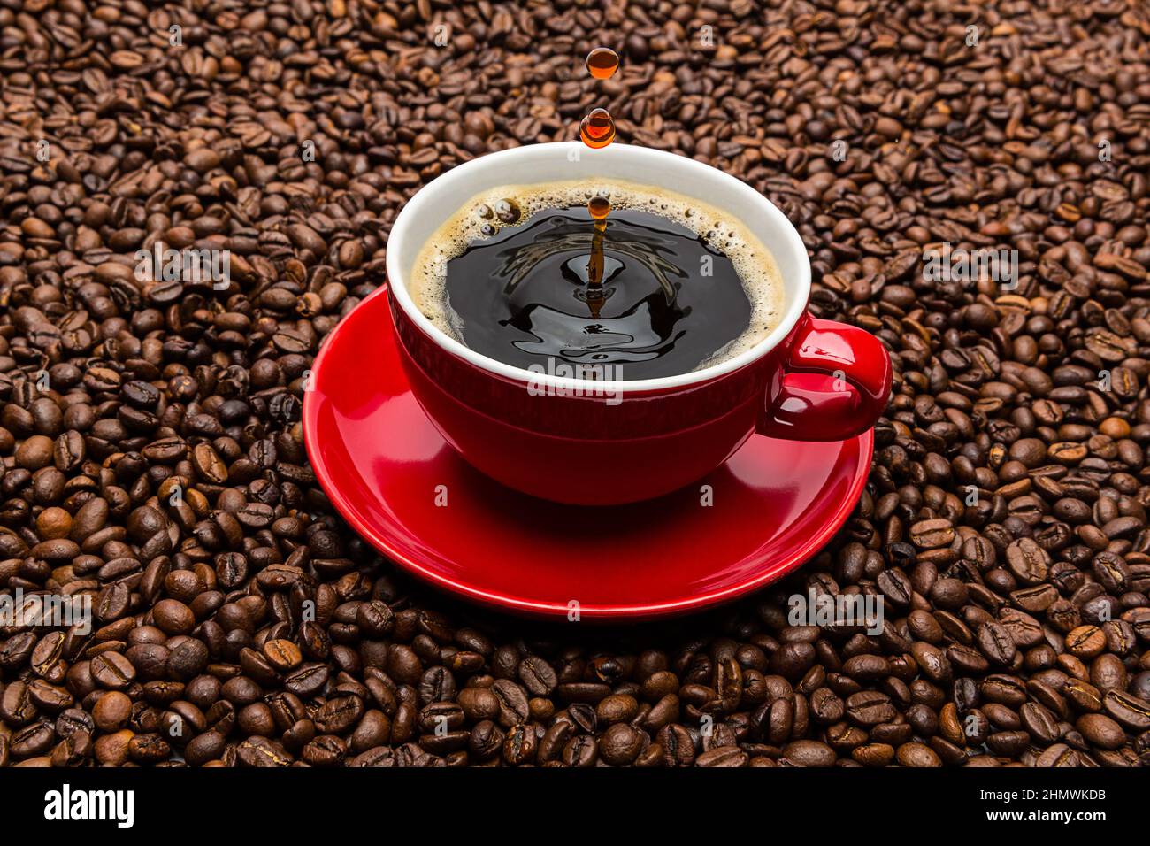 drop of coffee on beans Stock Photo - Alamy