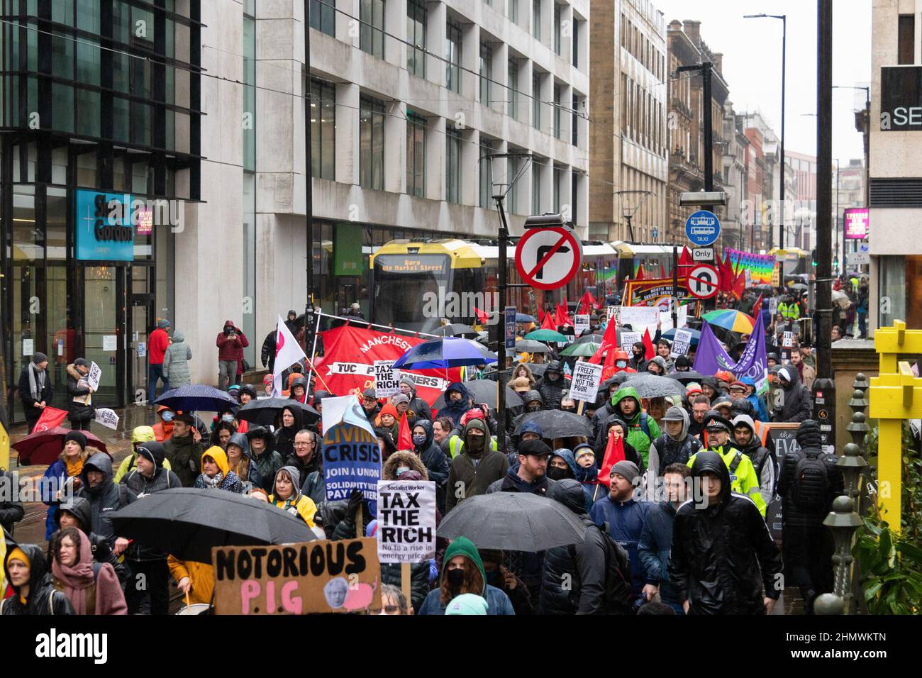 Protesters march through Manchester City Centre during the ...