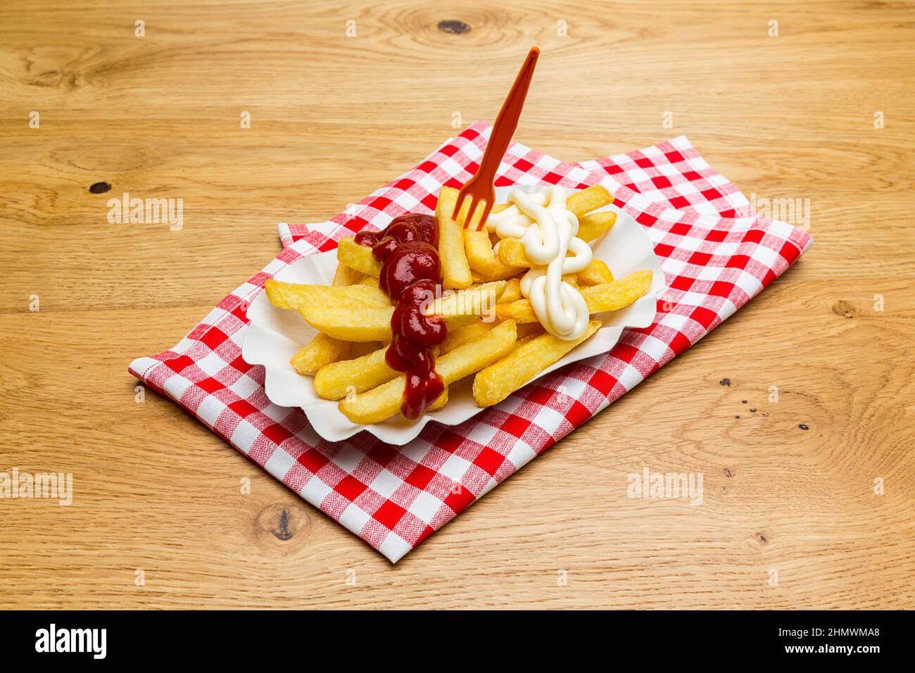 french fries red - white german pommes Stock Photo - Alamy