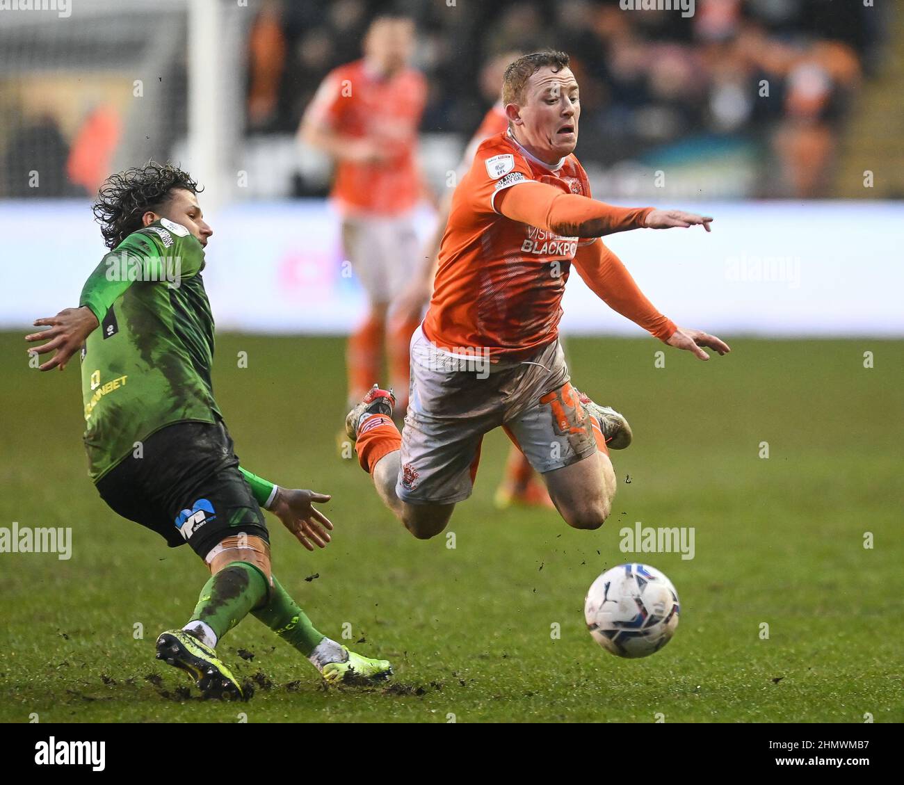 Shayne Lavery #19 of Blackpool is fouled by Emiliano Marcondes #11 of ...