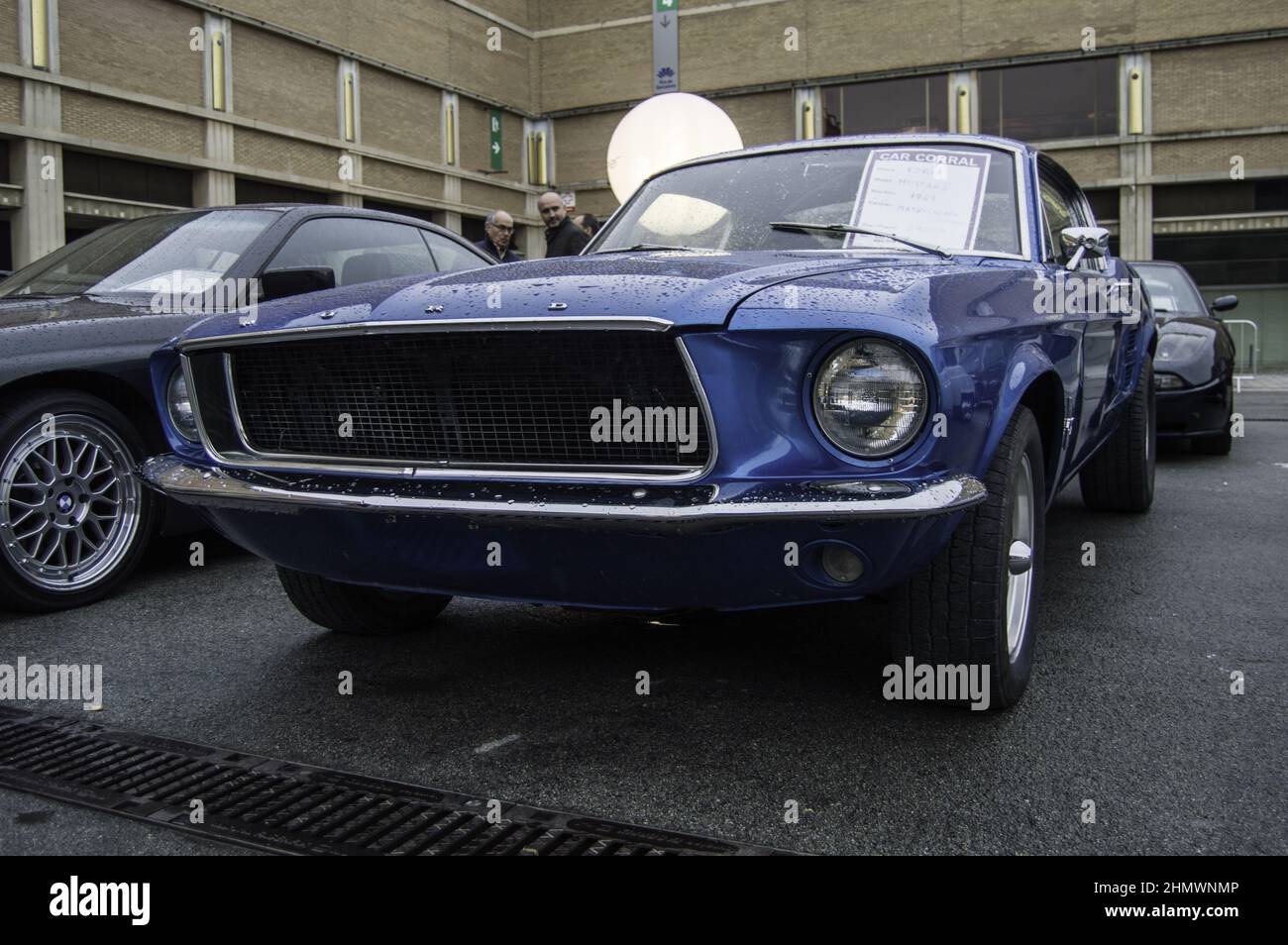 Classic nice blue car parked on a street Stock Photo - Alamy