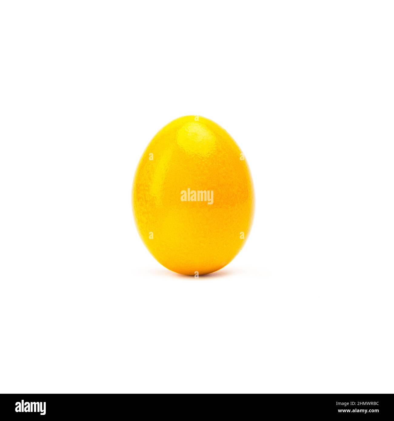 yellow easter egg on white Stock Photo - Alamy
