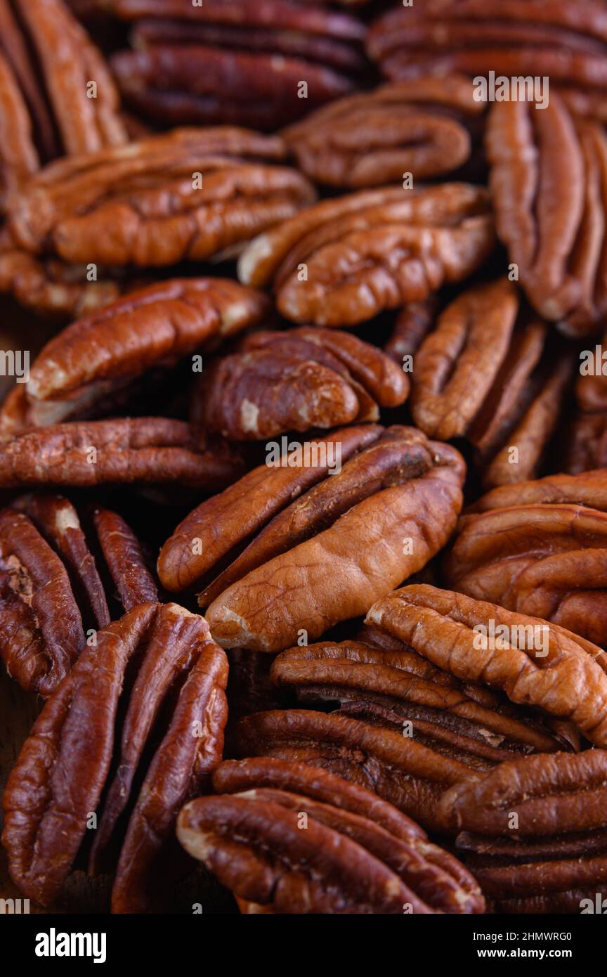 Pecan nuts background vertical photo close-up hd. High quality photo of ...